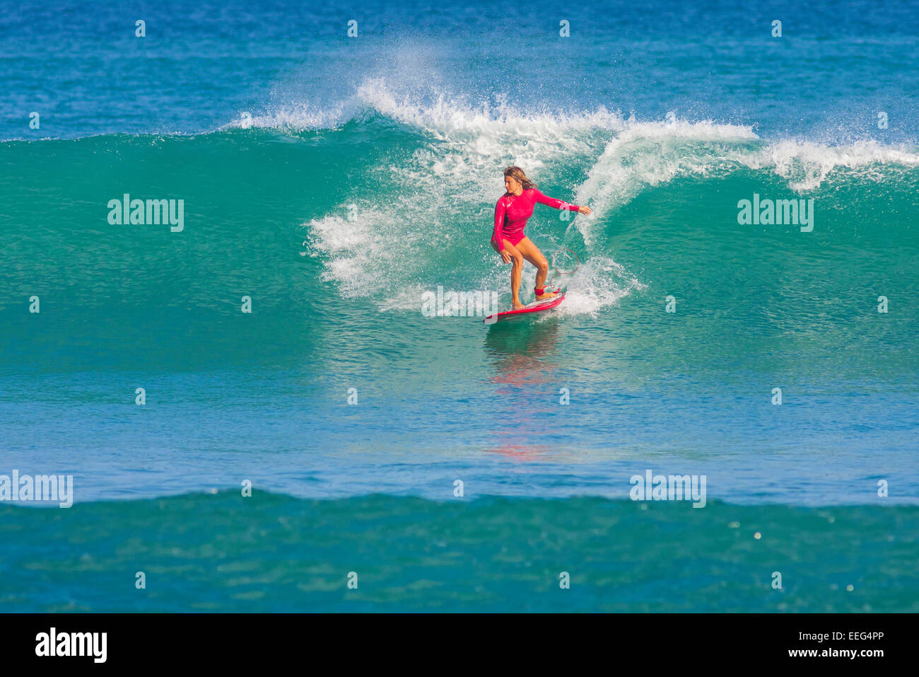 Surfer girl on wave indonesia hi-res stock photography and images - Alamy