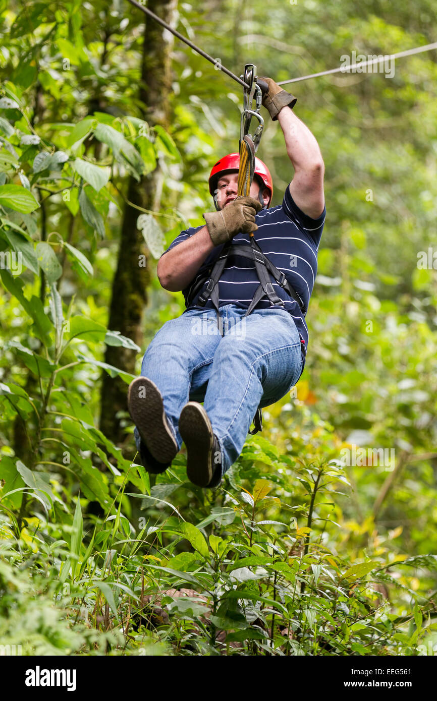 Adult man on zip line hi-res stock photography and images - Alamy