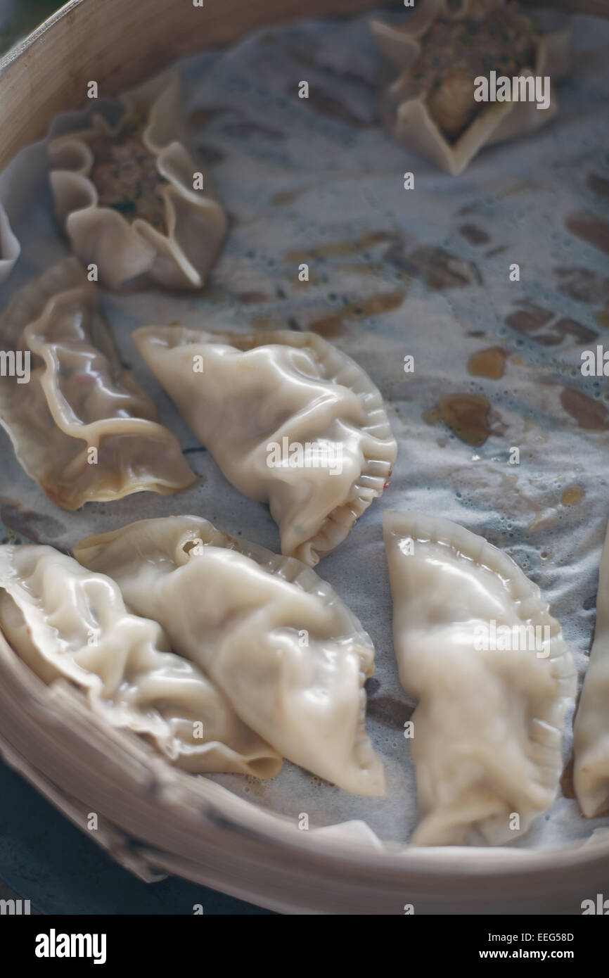 Dumpling gyoza in bamboo hi-res stock photography and images - Alamy