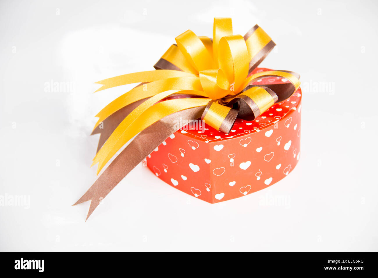Gold gift box with ribbon and bow isolated on white background Stock ...