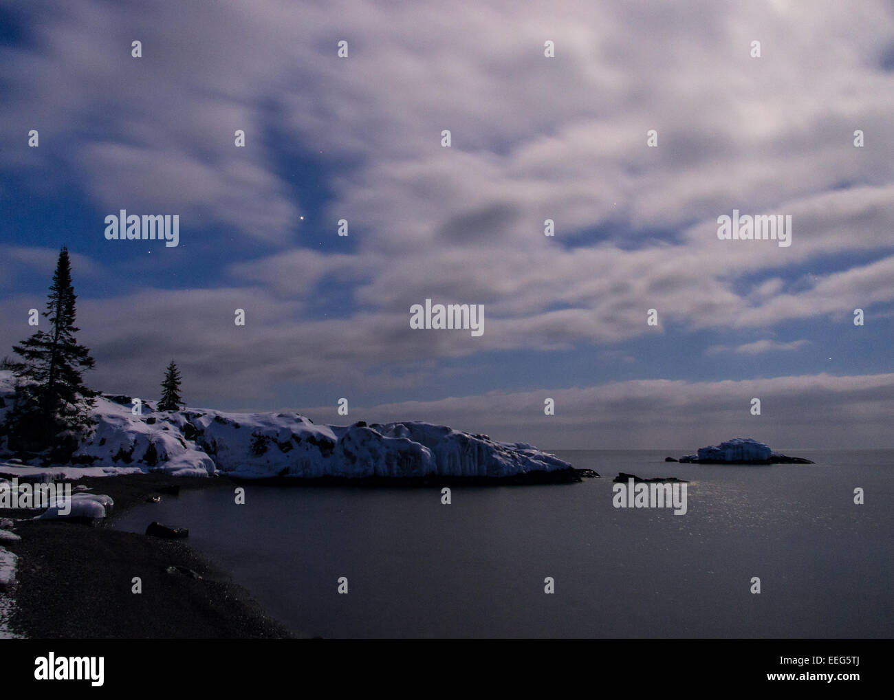 The Lake Superior shore under moonlight Stock Photo - Alamy