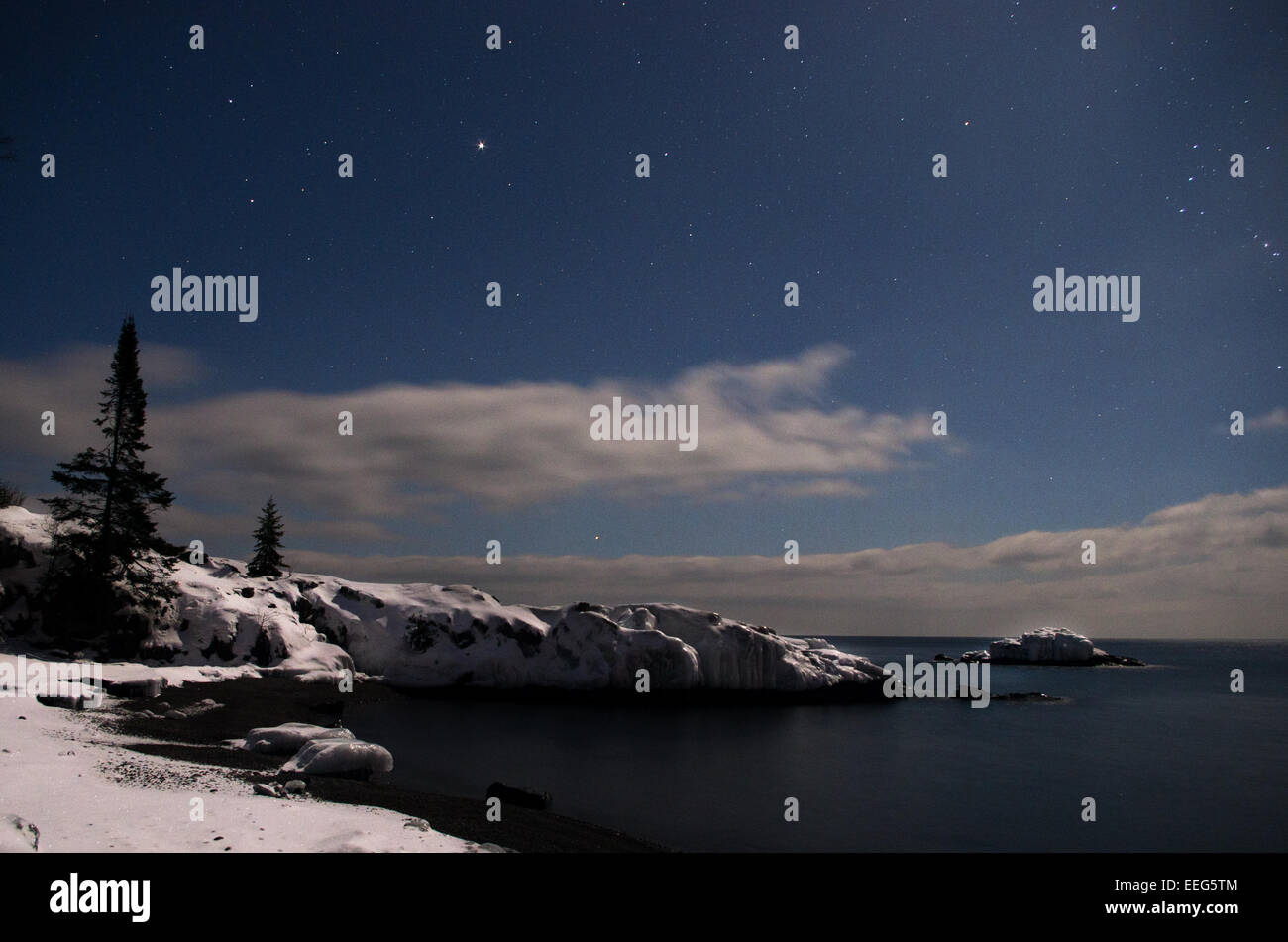 The Lake Superior shore under moonlight Stock Photo - Alamy