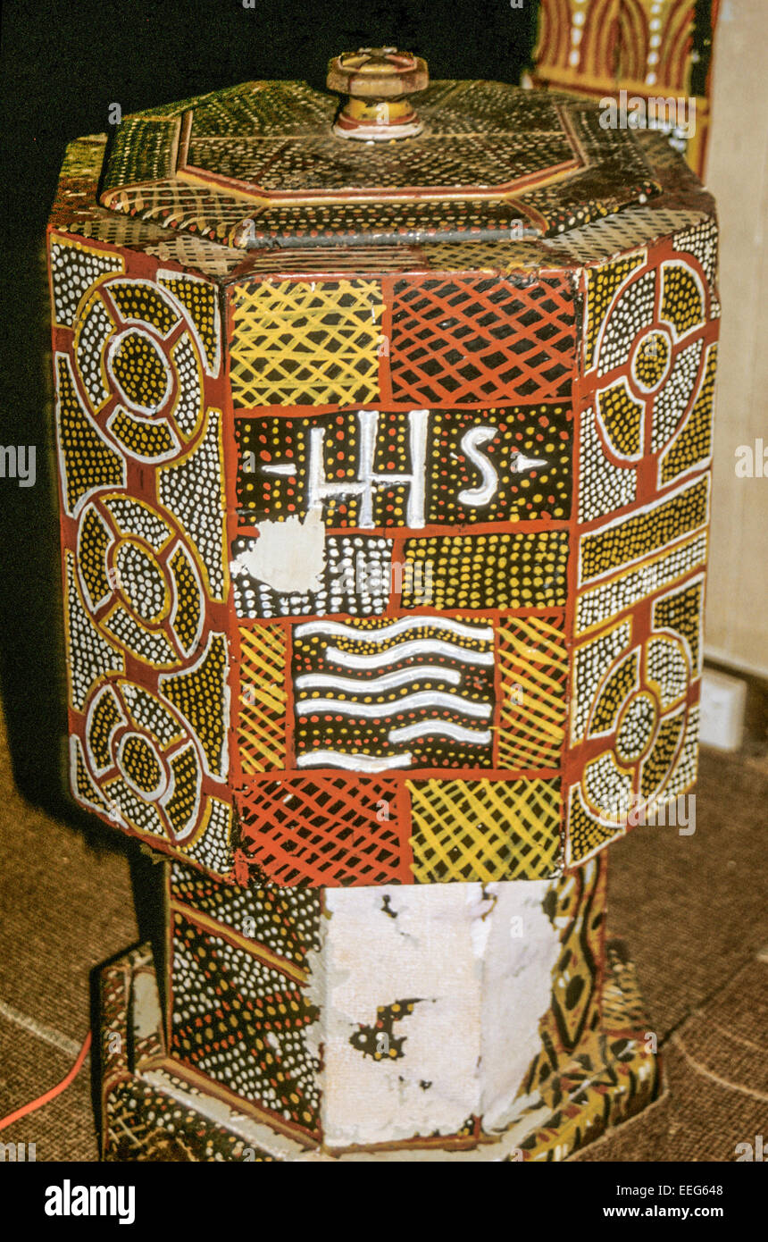 Font decorated with Tiwi aboriginal motifs at the Catholic mission ...