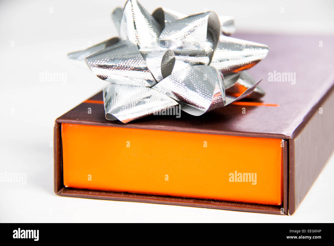 Gold gift box with ribbon and bow isolated on white background Stock ...