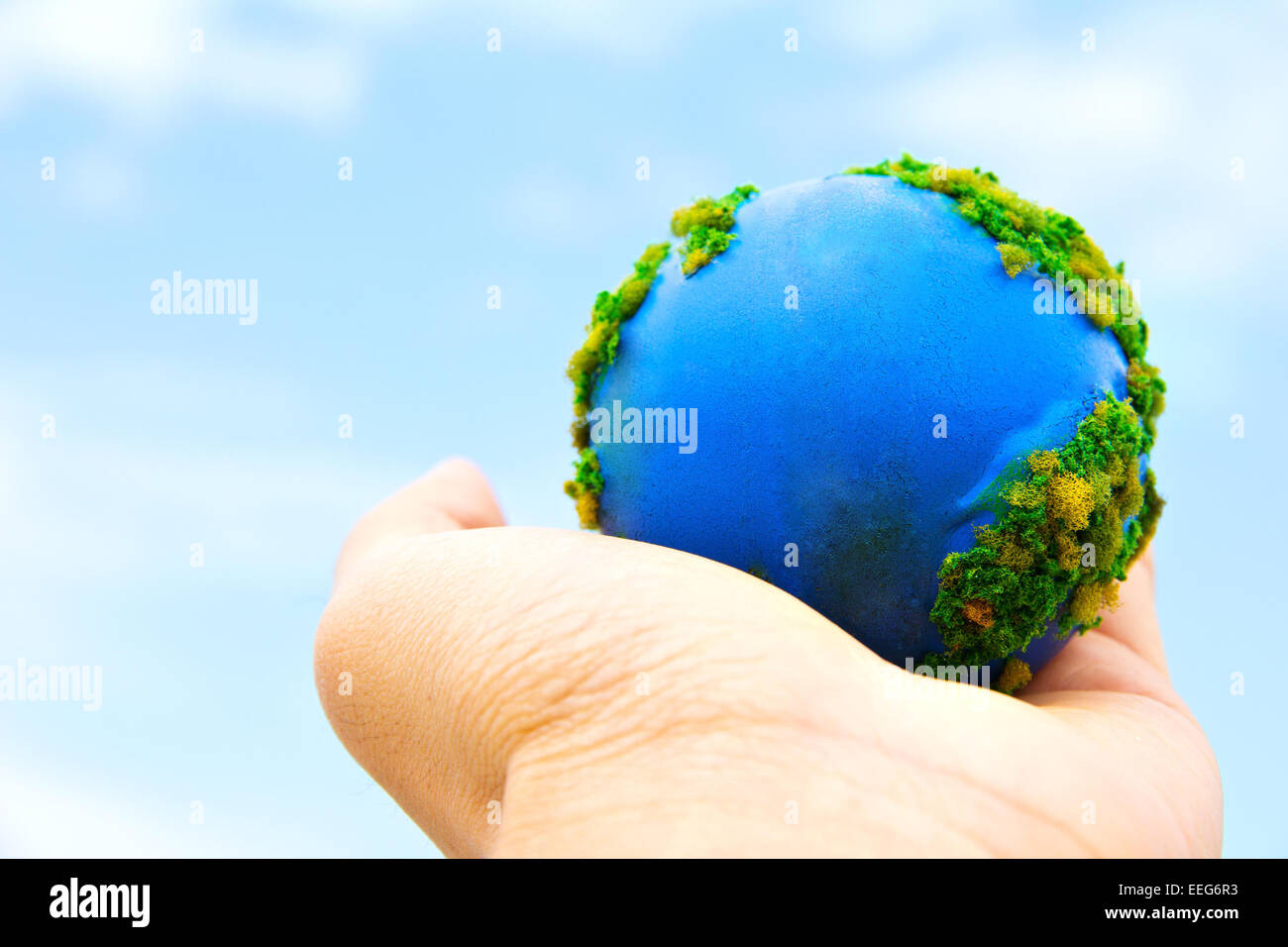 Hands and Earth Stock Photo - Alamy
