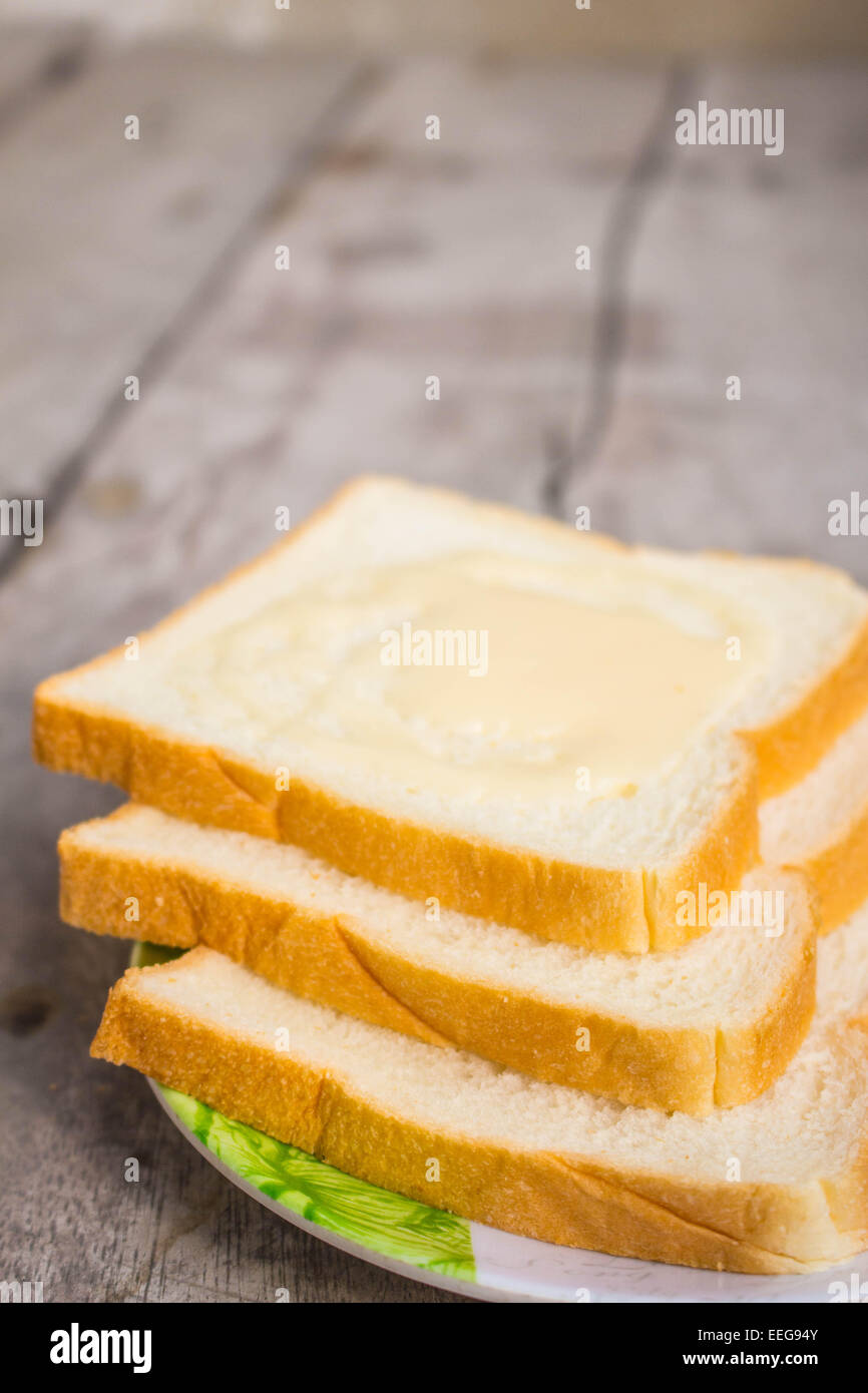 Three slices of bread arranged Stock Photo - Alamy