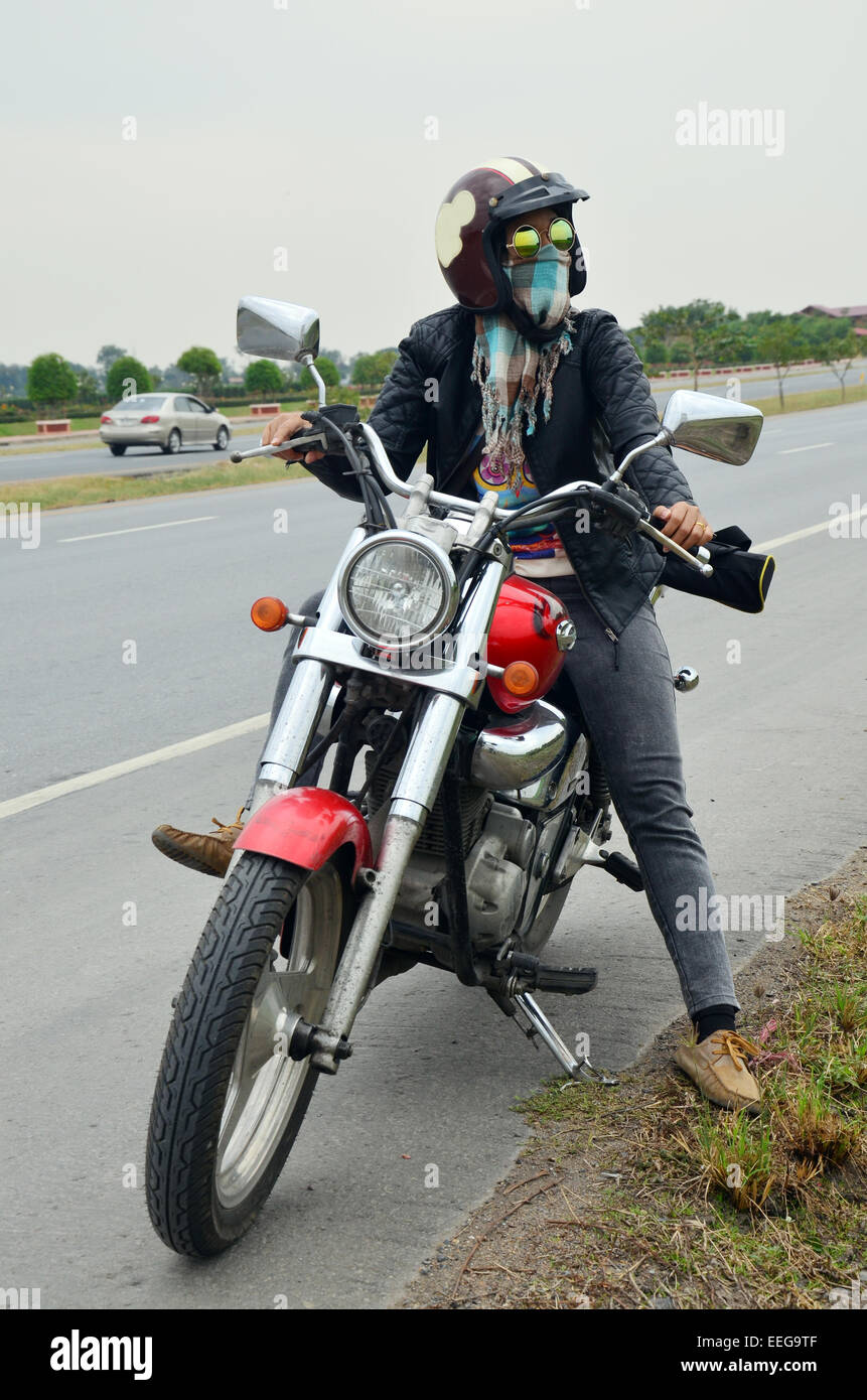 Thai woman riding chopper motorcycle on the way go to Ayutthaya with ...