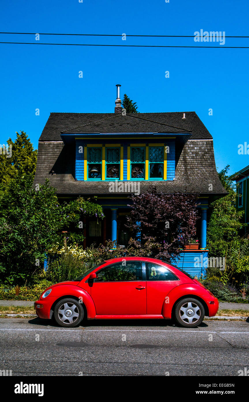 bright red car parked outside blue house in Seattle, USA Stock Photo ...