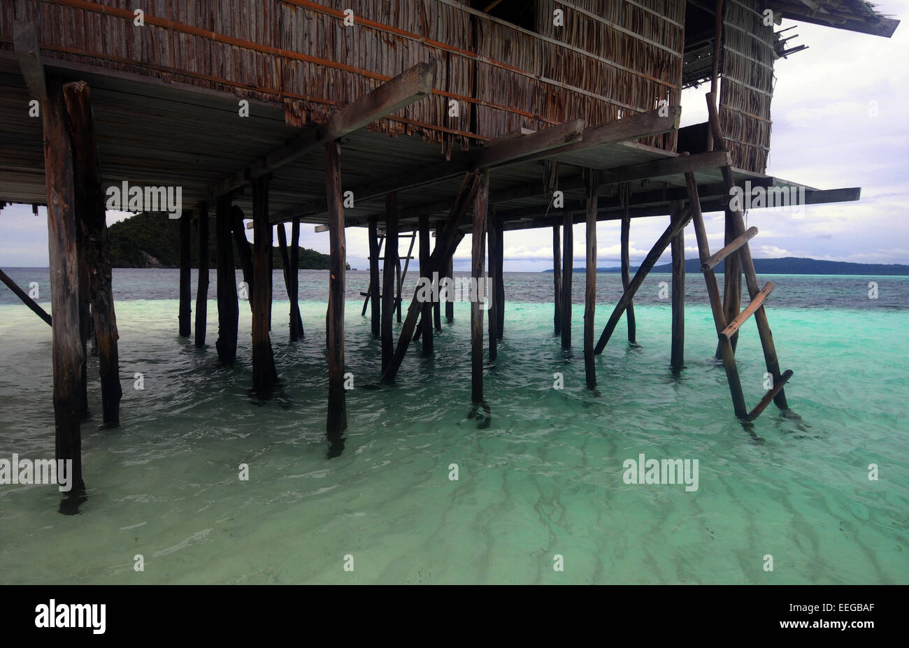 Wooden hut built out over the water in traditional Papuan style, Kri ...