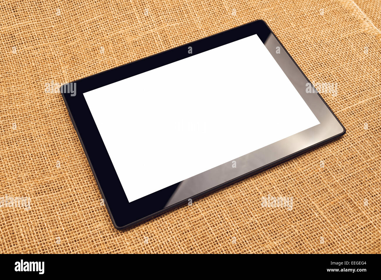 Digital Tablet Computer with Blank White Screen as Copy Space on Office ...