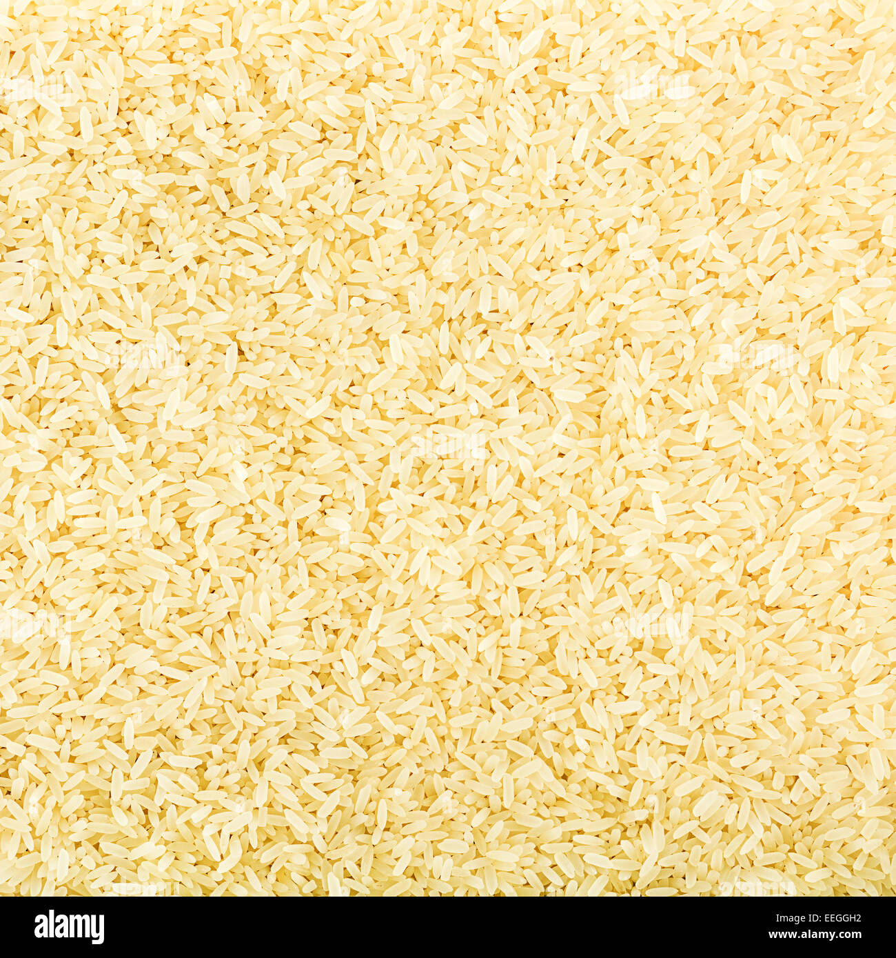 long grain brown rice. great food background Stock Photo - Alamy