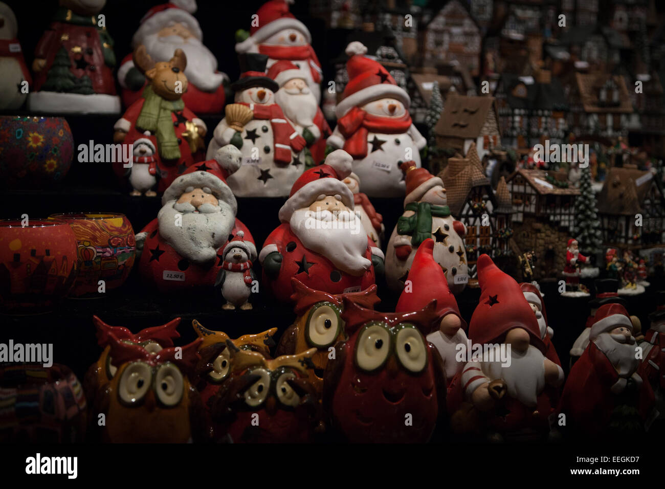 Santa and other Christmas ornaments on a store shelf Stock Photo - Alamy