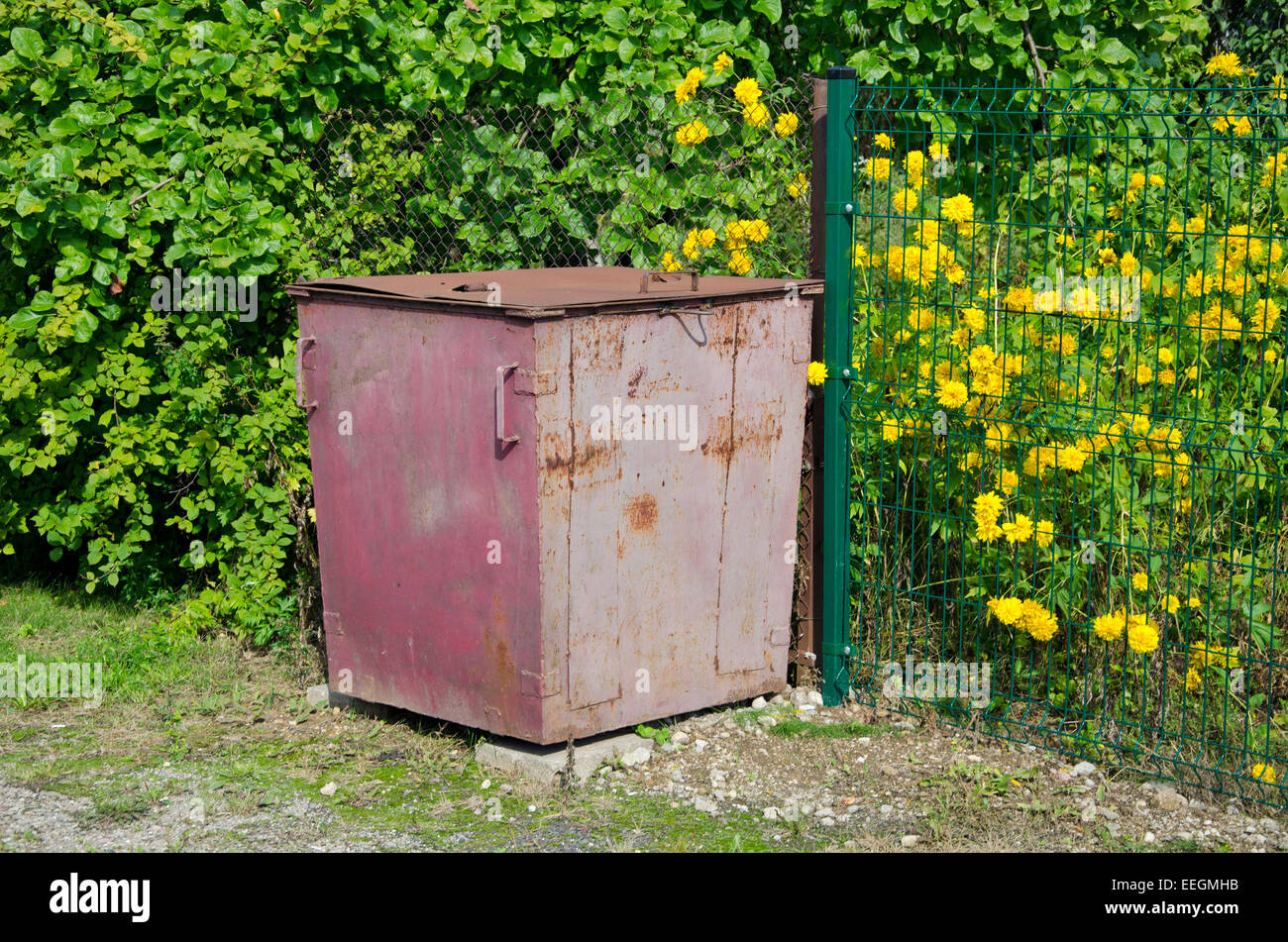 Old metal garbage container box on street Stock Photo - Alamy