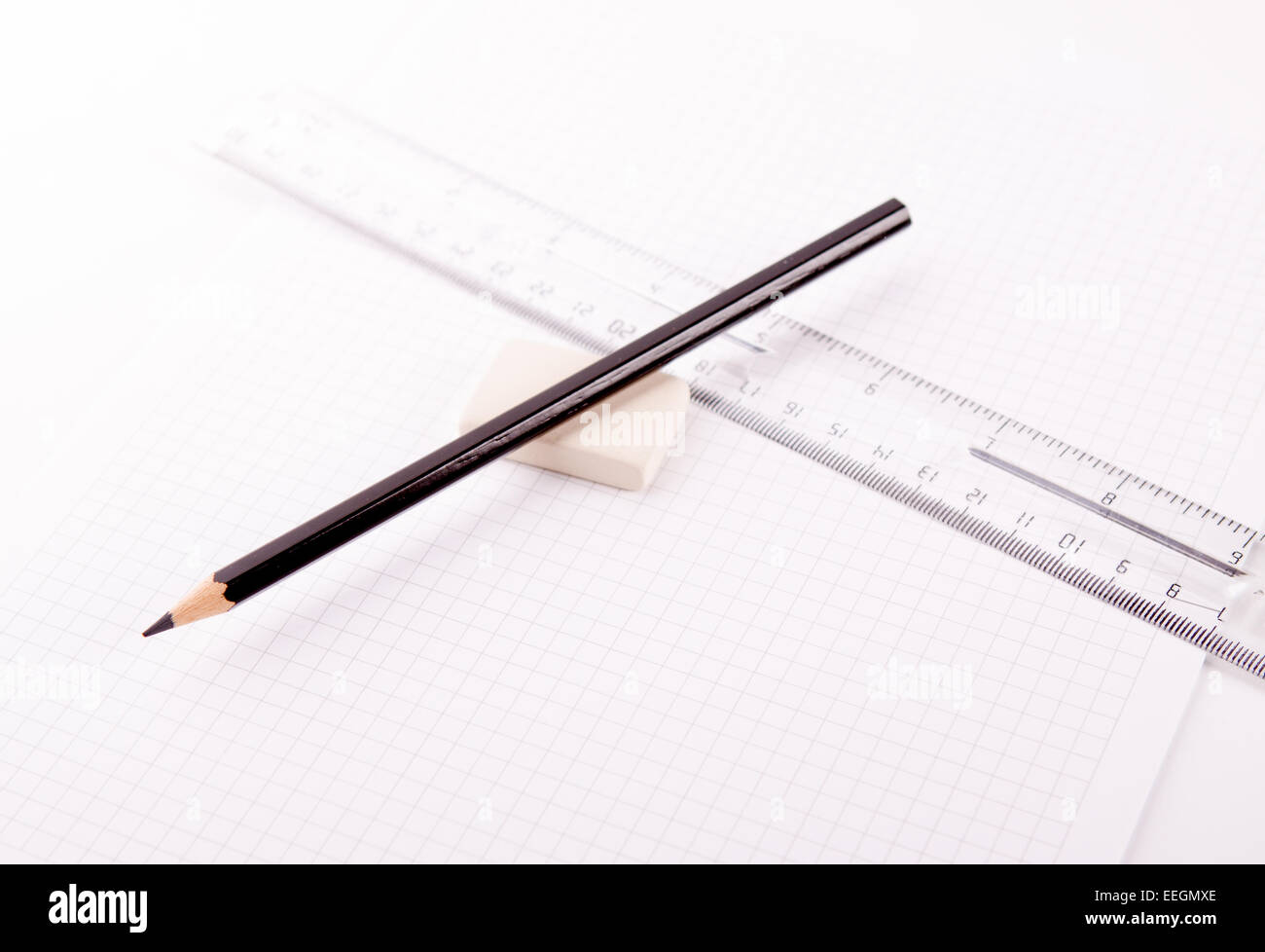 Notebook paper background with pencil and eraser Stock Photo - Alamy