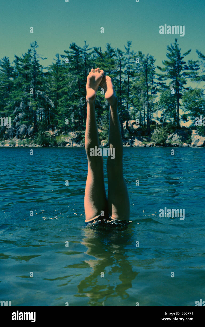 Woman Doing Handstand Under Water High Resolution Stock Photography and ...