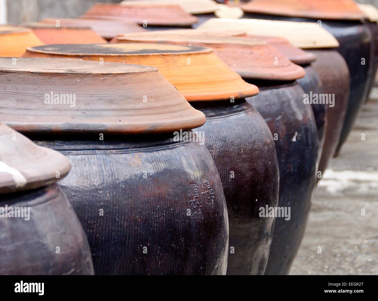 Jar with soy sauce waiting for maturing in Taiwan Stock Photo - Alamy