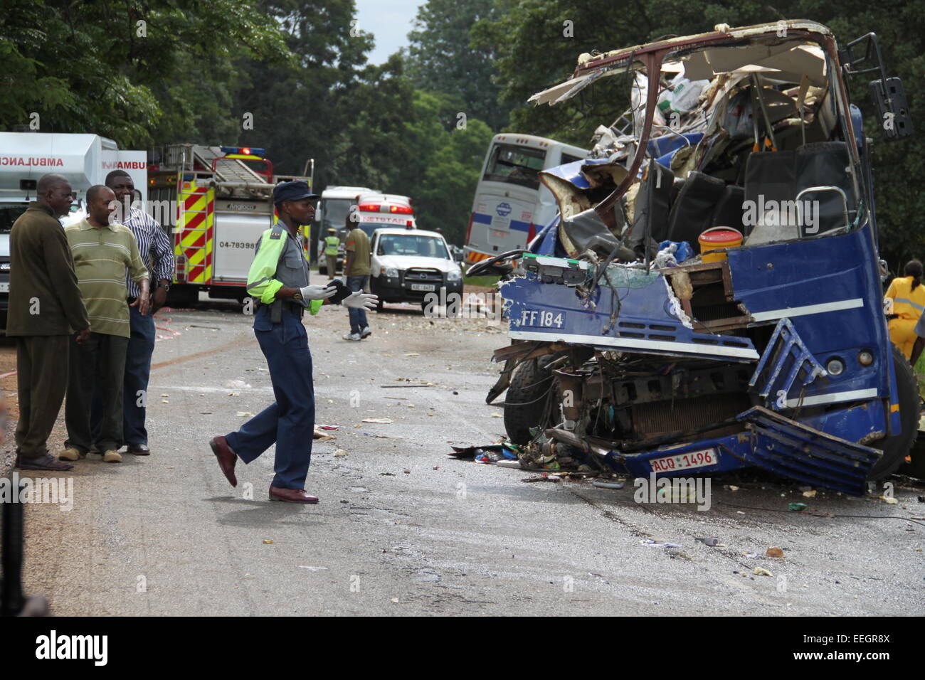 Harare. 18th Jan, 2015. Rescue personnel work at the site of bus ...