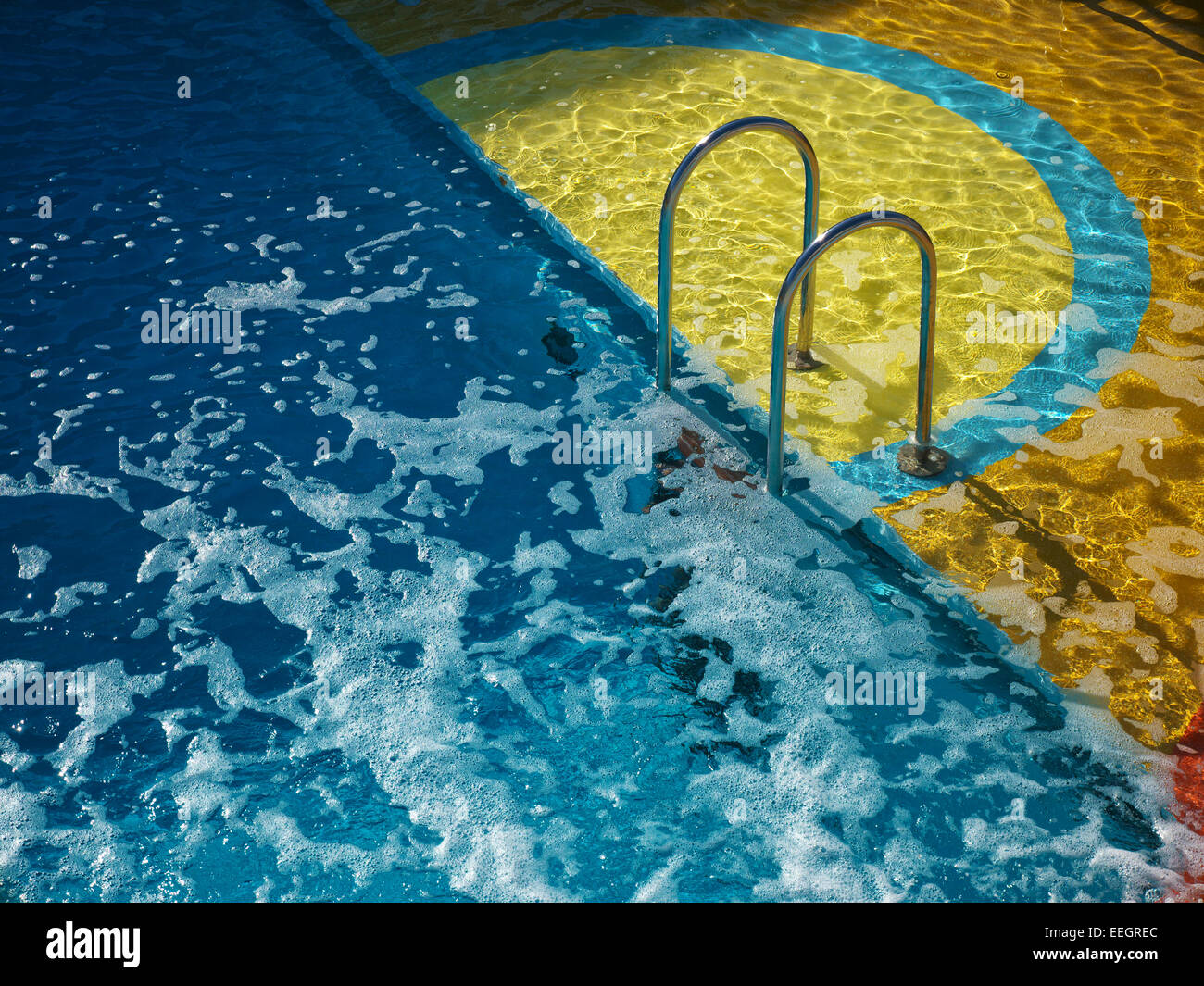Brightly colored swimming pool and ladder on cruise ship Stock Photo ...