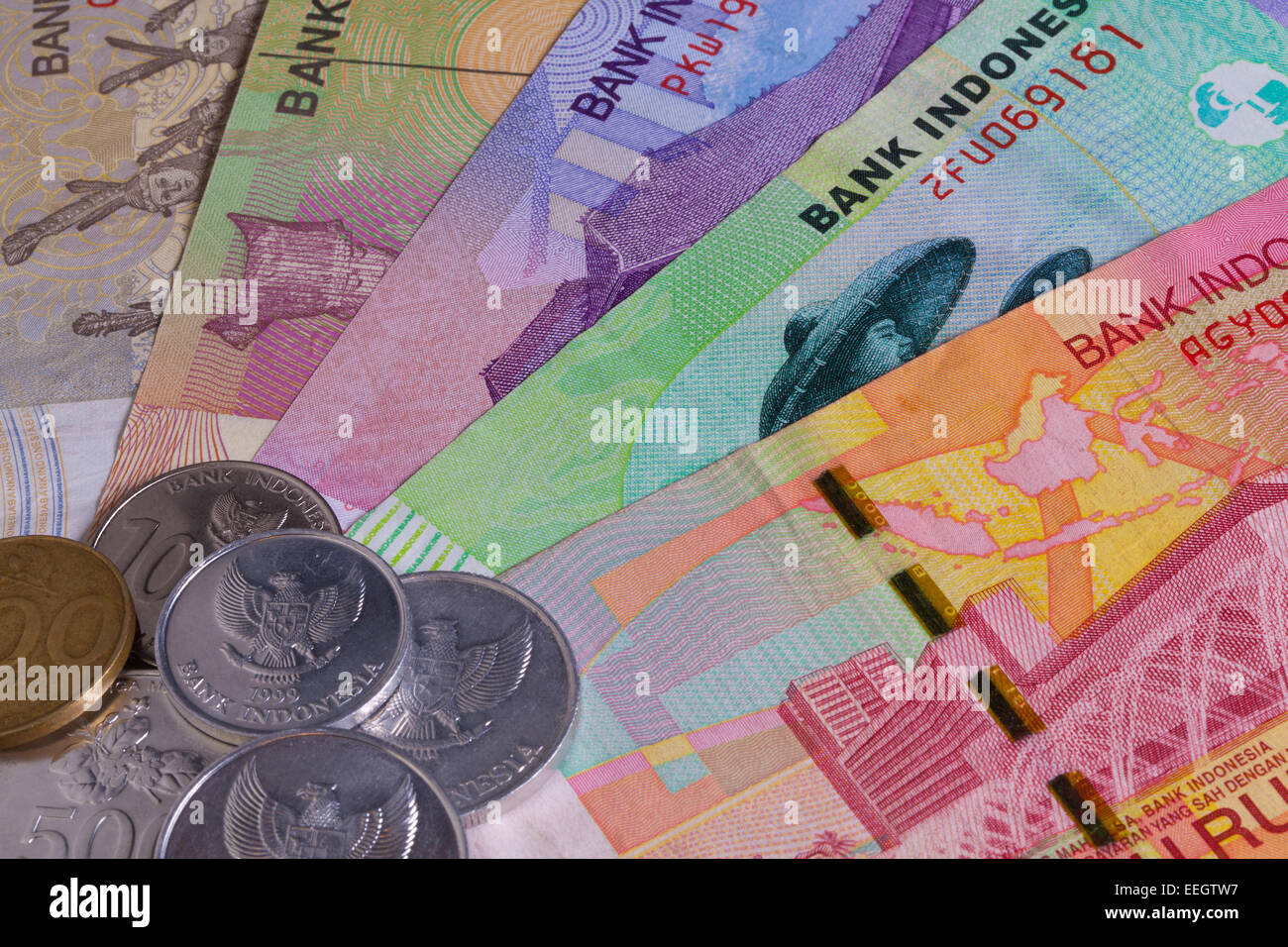 Different Indonesian rupiah banknotes on the table Stock Photo - Alamy