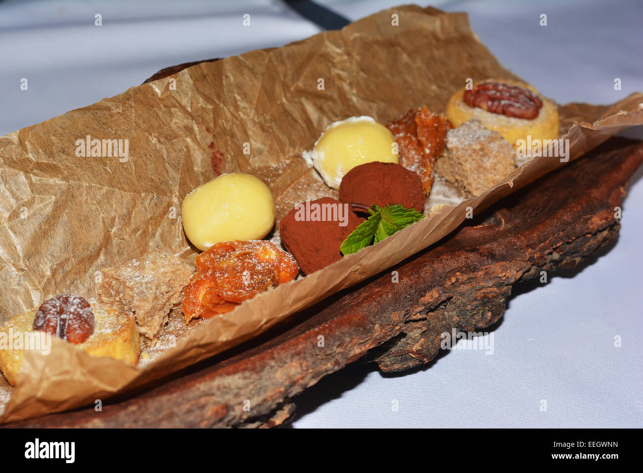 Sweet candy on parchment paper Stock Photo - Alamy