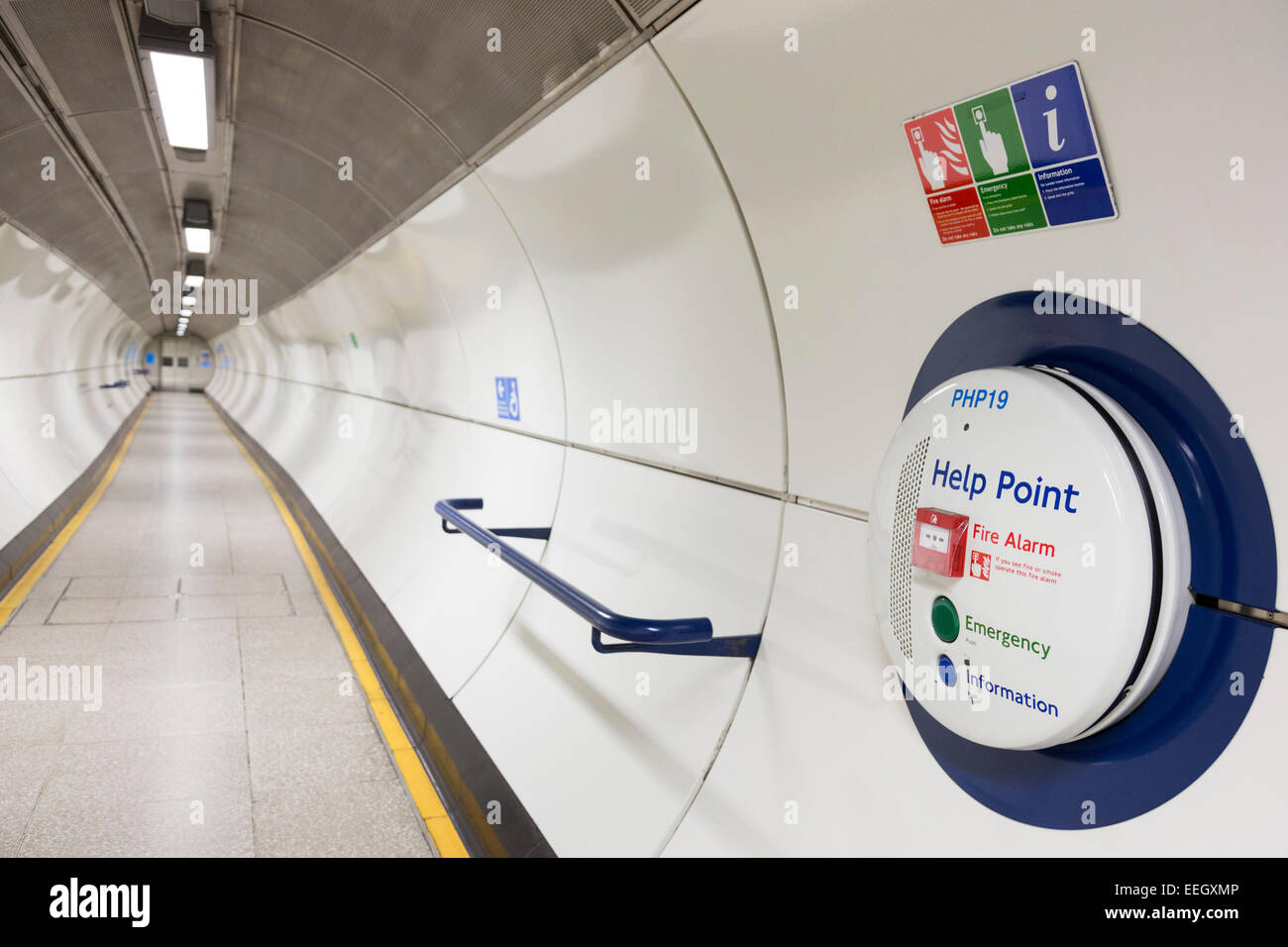 Long tunnel leading to a lift on the London Underground at London ...