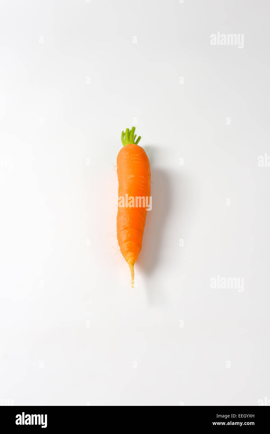 Raw fresh carrot on white background Stock Photo - Alamy