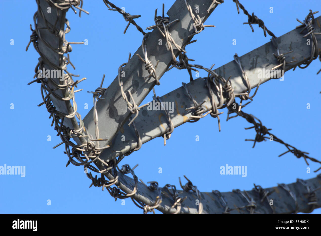 Barbed Wire Power Pylon Stock Photo - Alamy