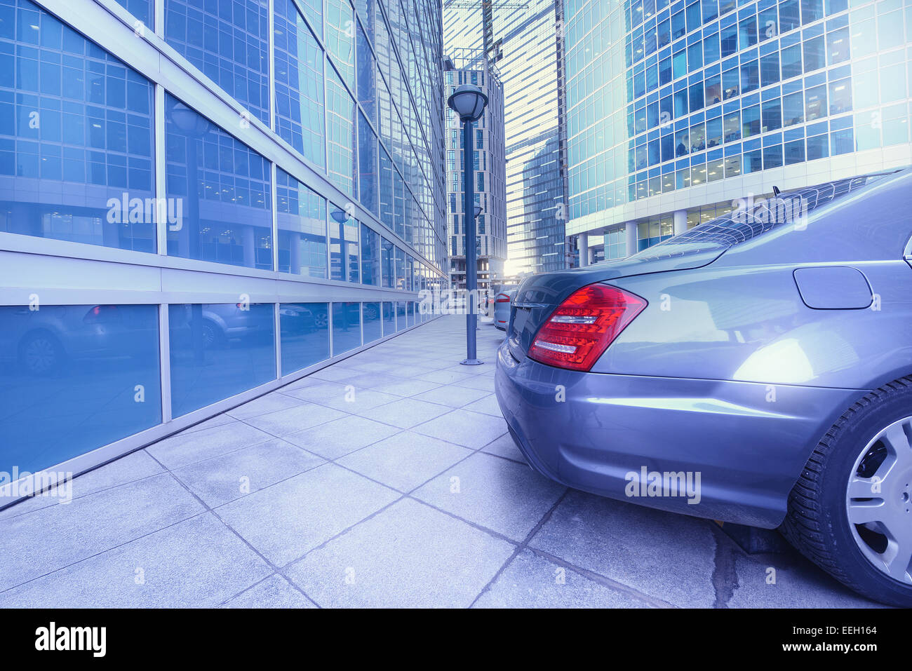 Car parking in the buiness city center Stock Photo - Alamy