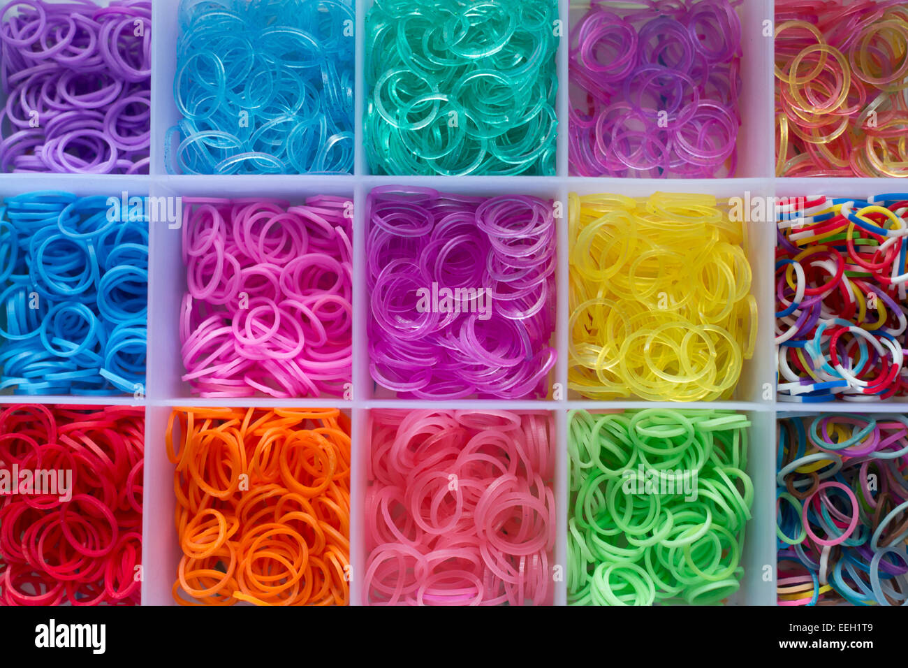 Selection of colorful rubber bands for bracelets Stock Photo - Alamy