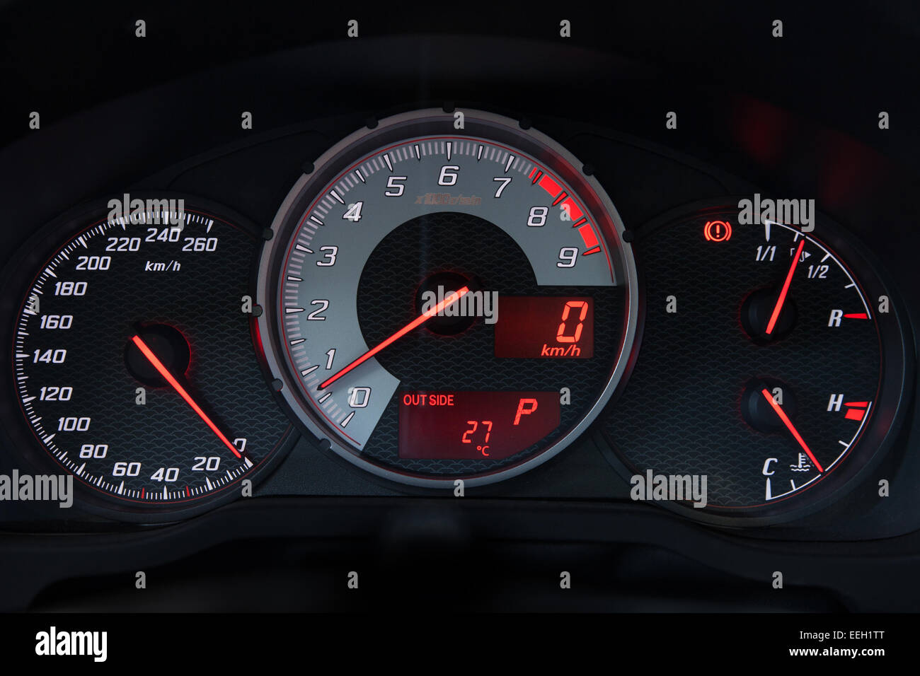 Dashboard of a modern sports car, speedometer, RPM pointer, temperature ...