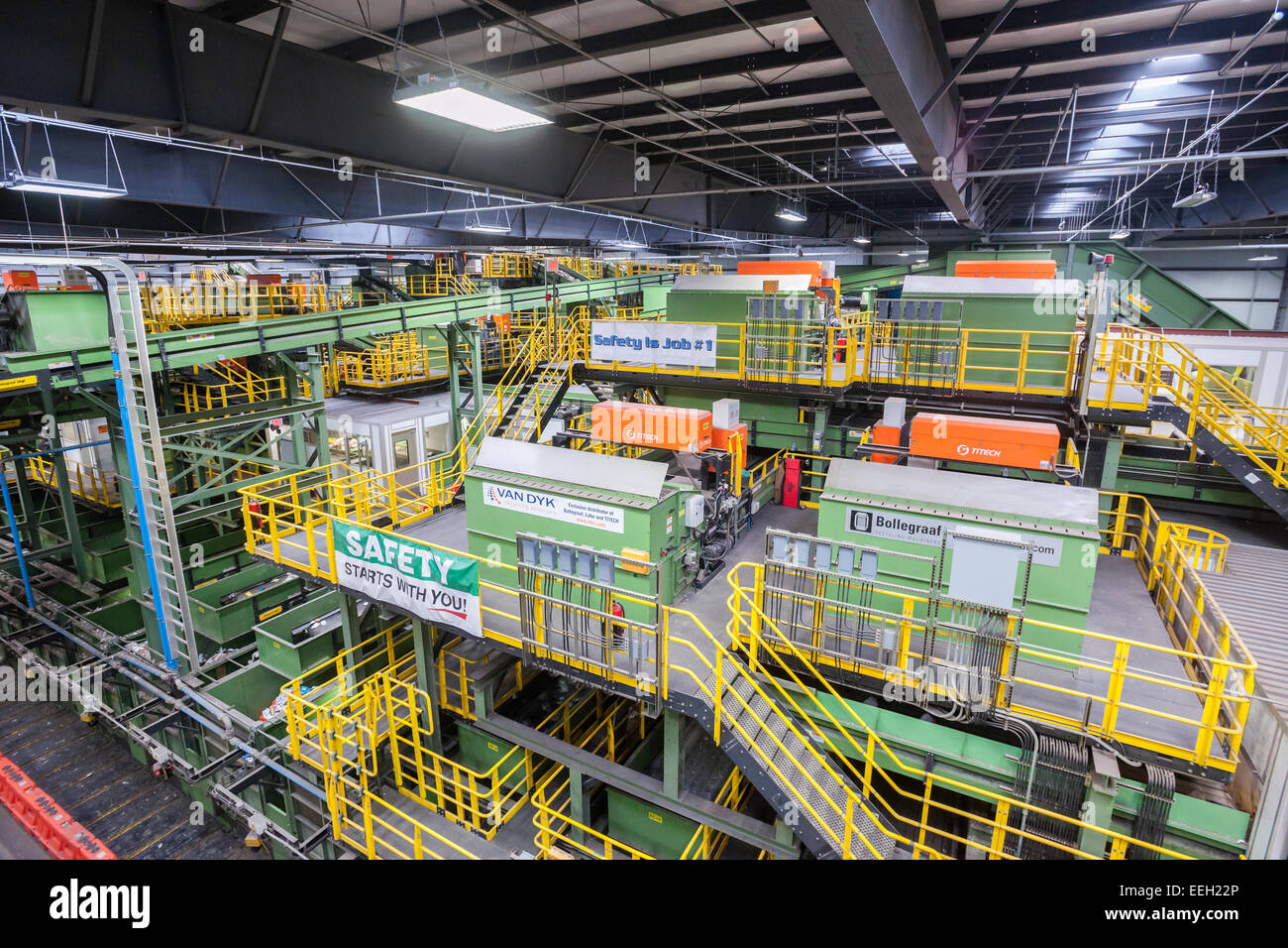 Signs promoting safety on machinery to process recyclables from the ...