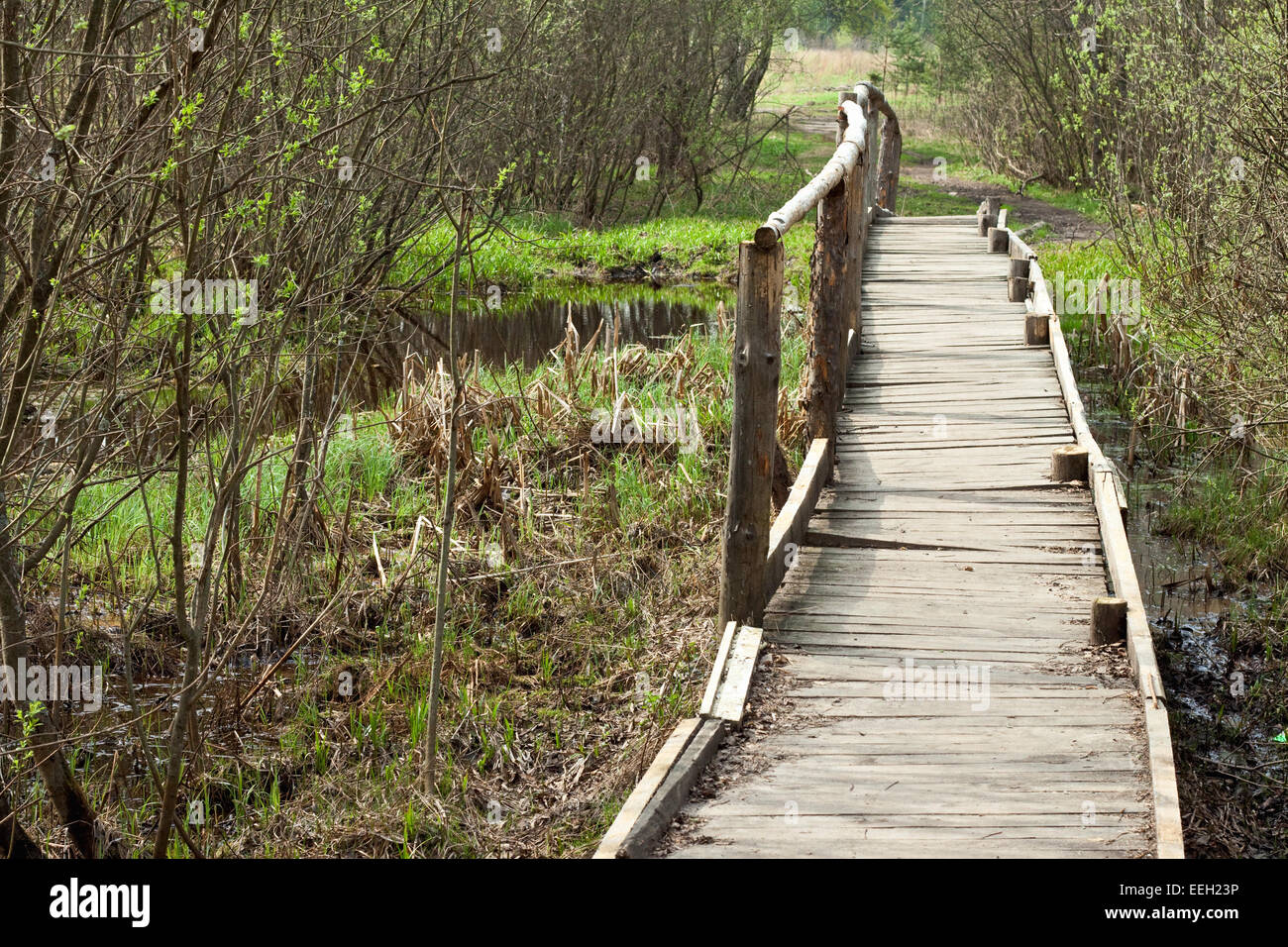 Wooden rustic footbridge hi-res stock photography and images - Alamy
