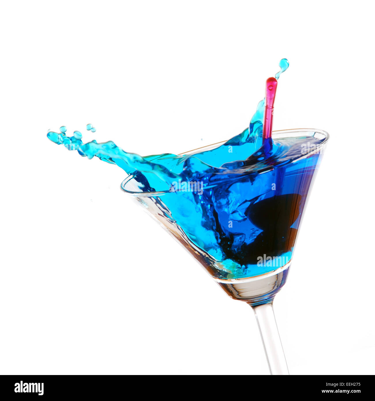 blue cocktail splashing on white background Stock Photo - Alamy