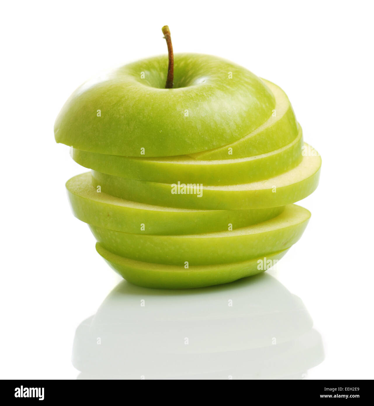 sliced green apple isolated on white Stock Photo - Alamy