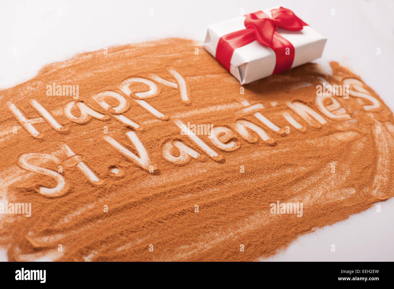 Romantic message written with chocolate powder Stock Photo - Alamy