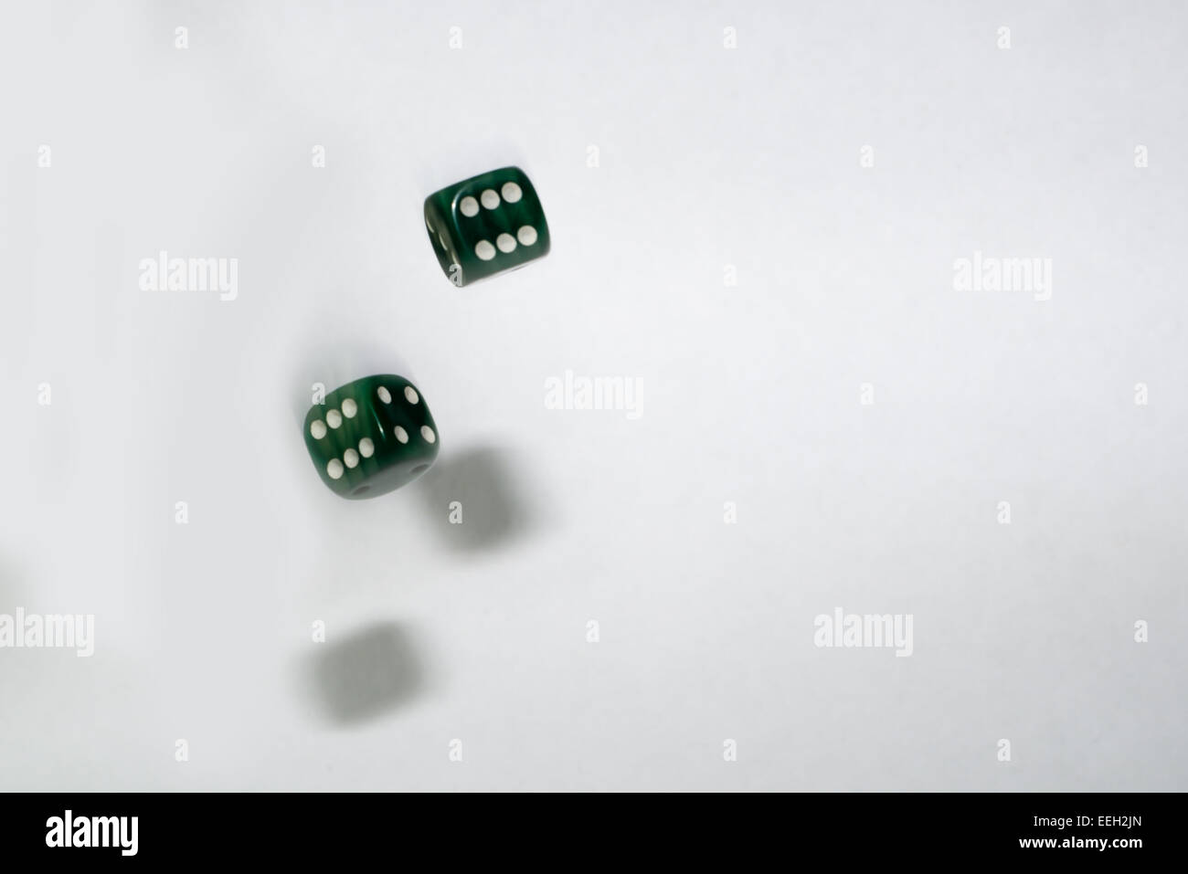 Rolling dice hi-res stock photography and images - Alamy