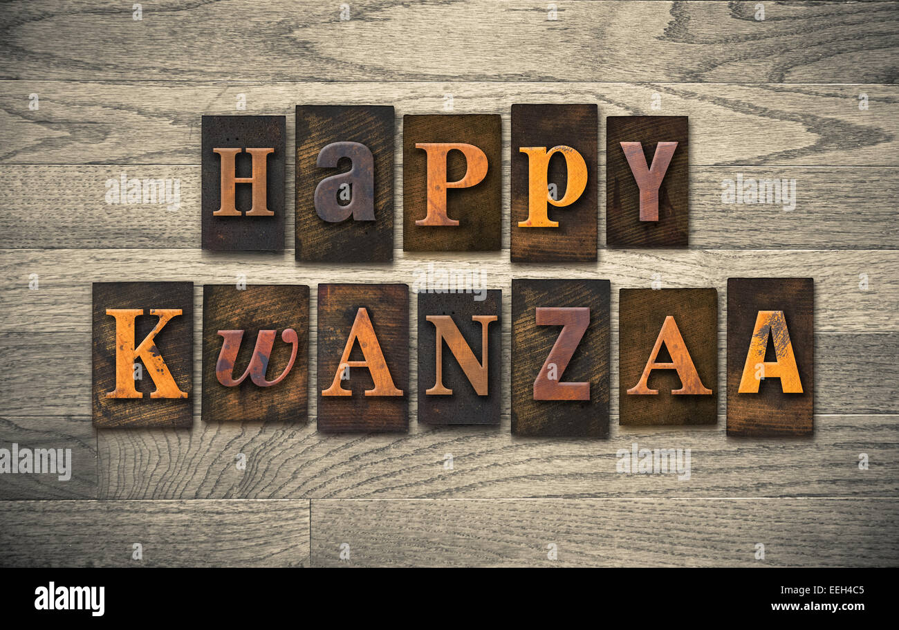 The words "HAPPY KWANZAA" written in vintage wooden letterpress type ...