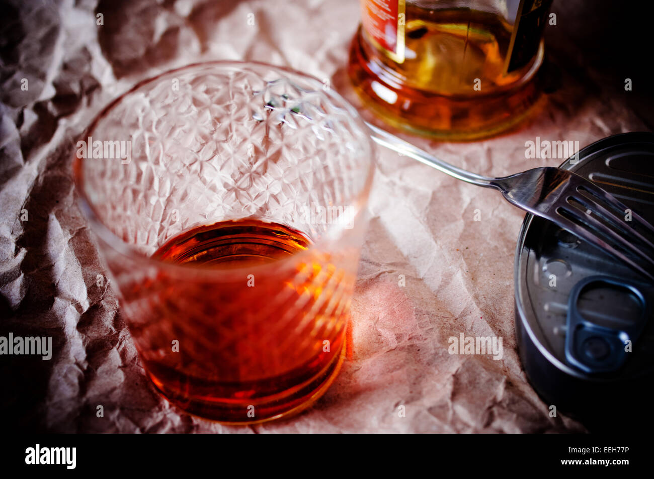 Shot with cognac, brandy on the table in dim lighting Stock Photo - Alamy