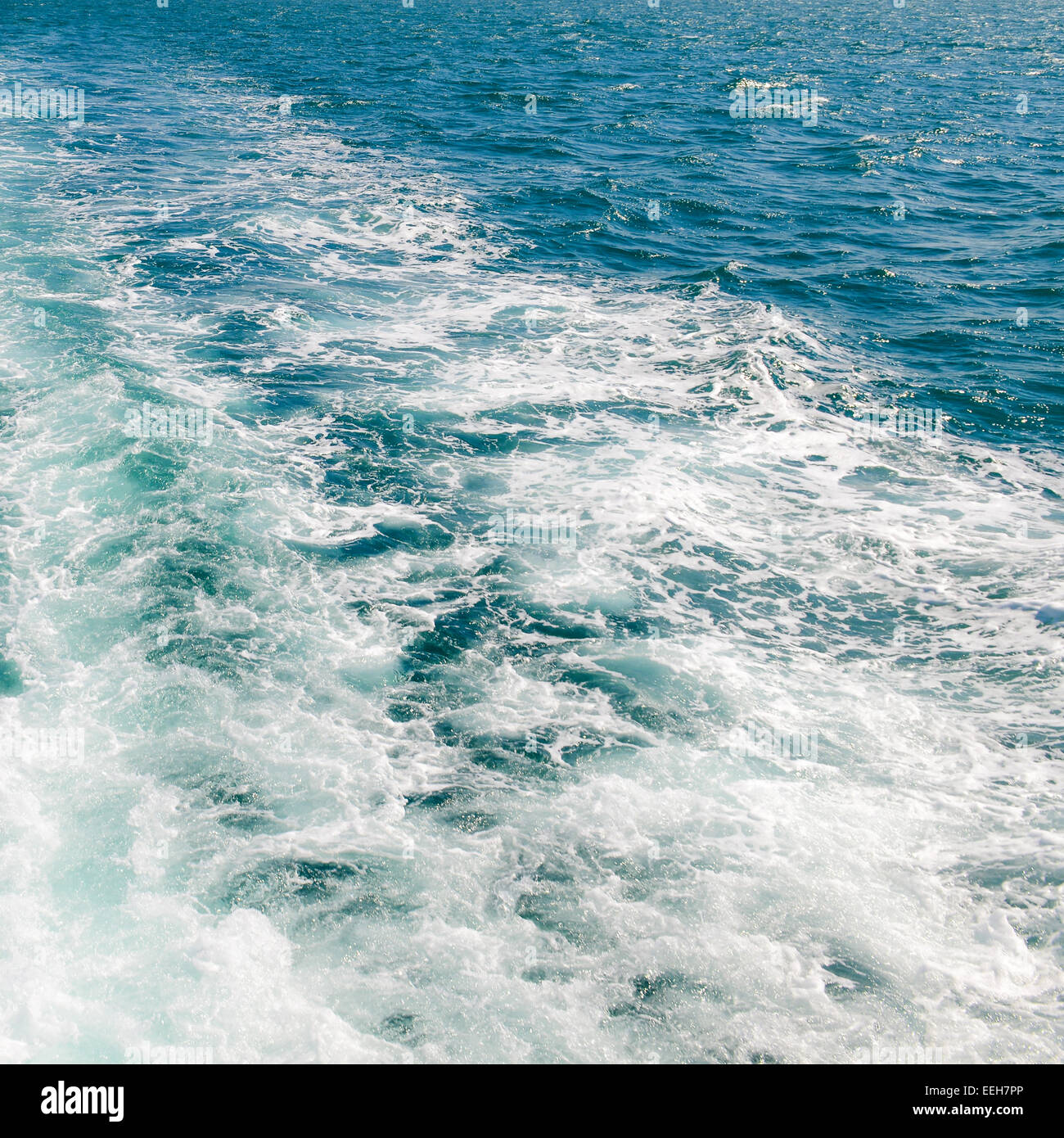 The wake of a boat as seen from the stern of a ship Stock Photo - Alamy
