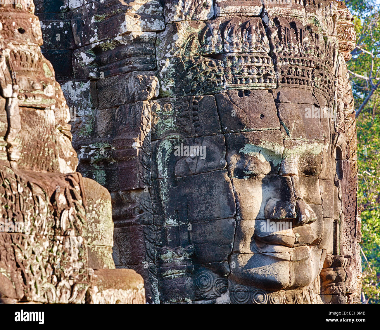 Bayon temple statue carving of the face Stock Photo - Alamy