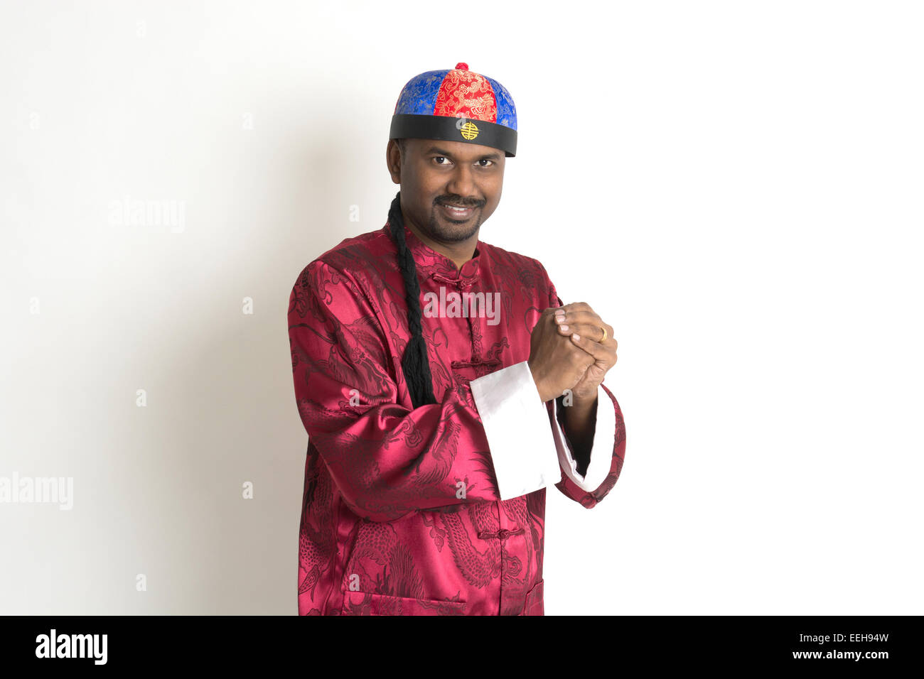 indian male with chinese new year clothes Stock Photo - Alamy