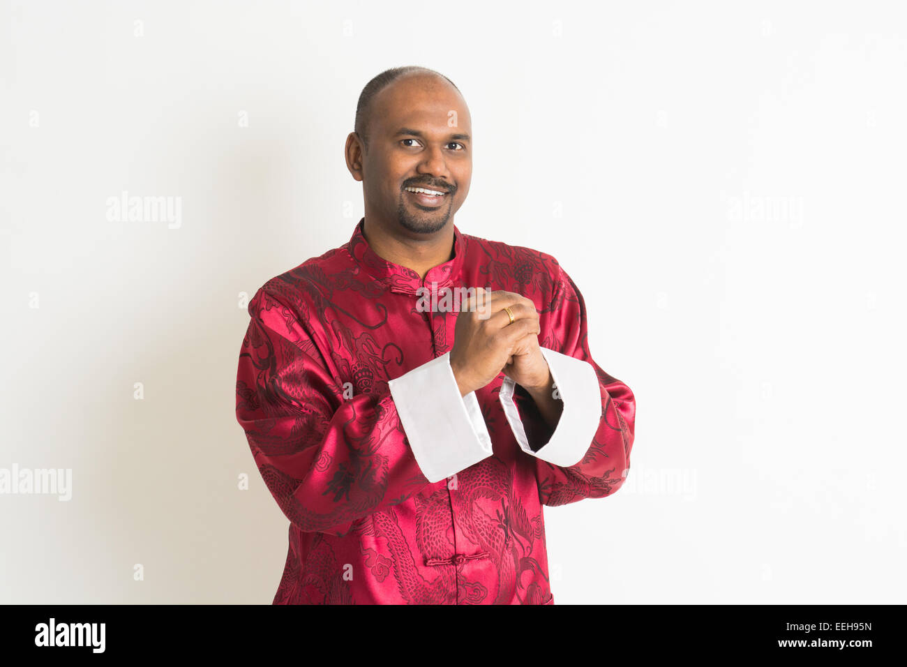 indian male with chinese new year clothes Stock Photo - Alamy
