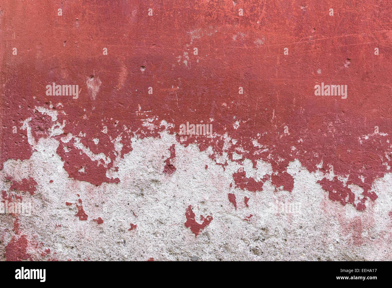 Detail of a wall with red plaster peeling Stock Photo - Alamy