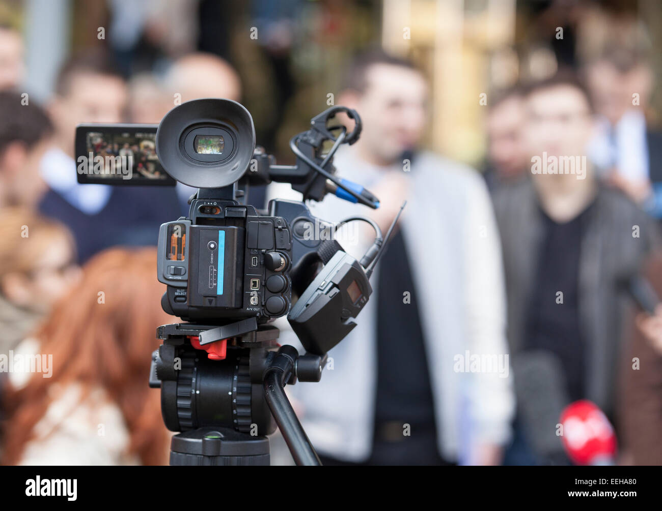covering an event with a video camera Stock Photo - Alamy