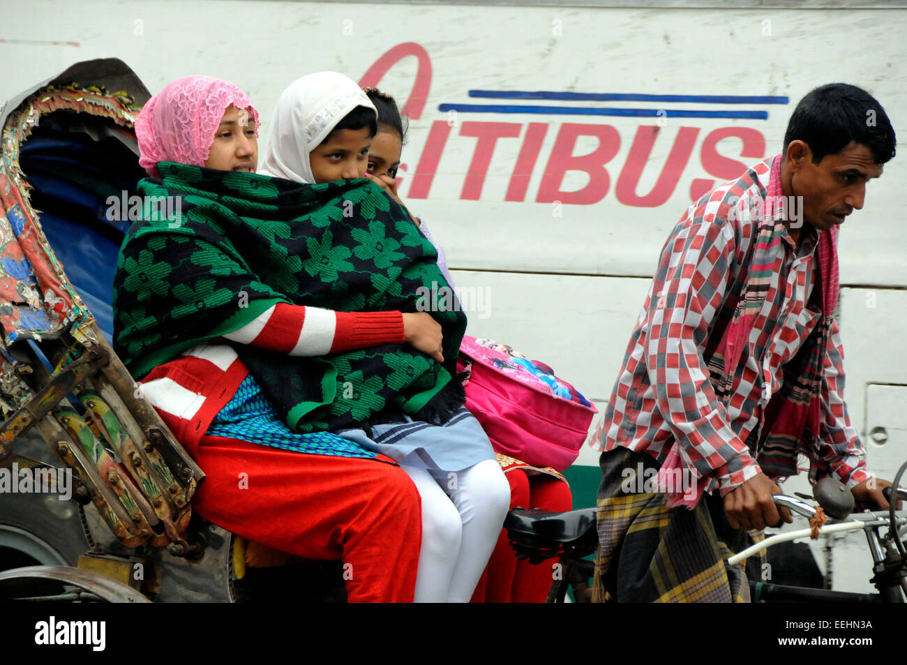 Dhaka, Bangladesh. 19th Jan, 2015. Citizens wear warm clothes during ...