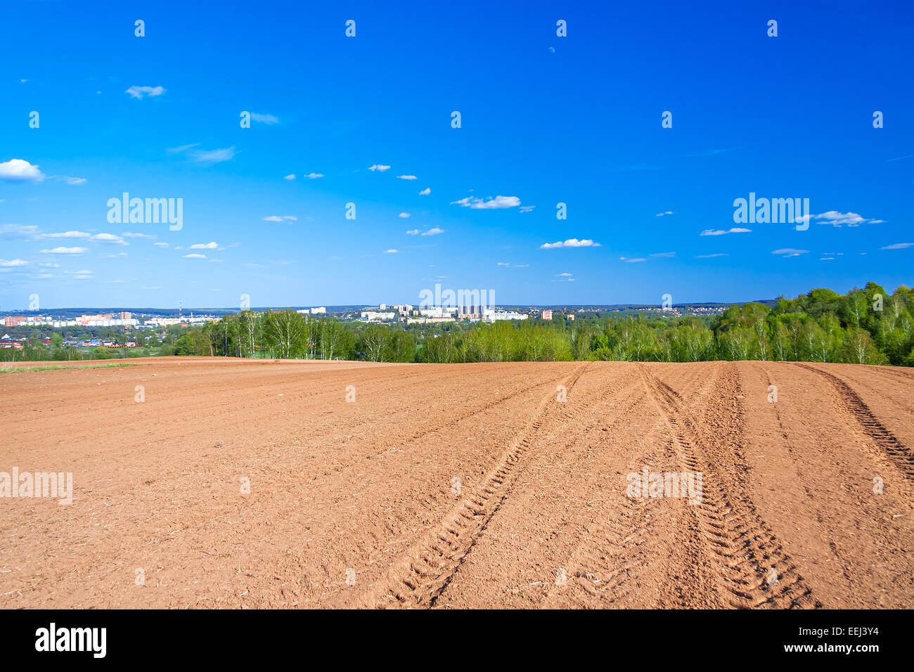 The agricultural arable land field in the spring for crops Stock Photo ...