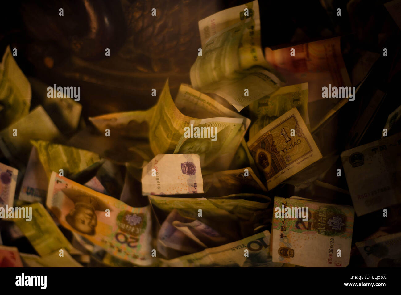 Bills in the offer box of the Lama Temple, Beijing China Stock Photo ...