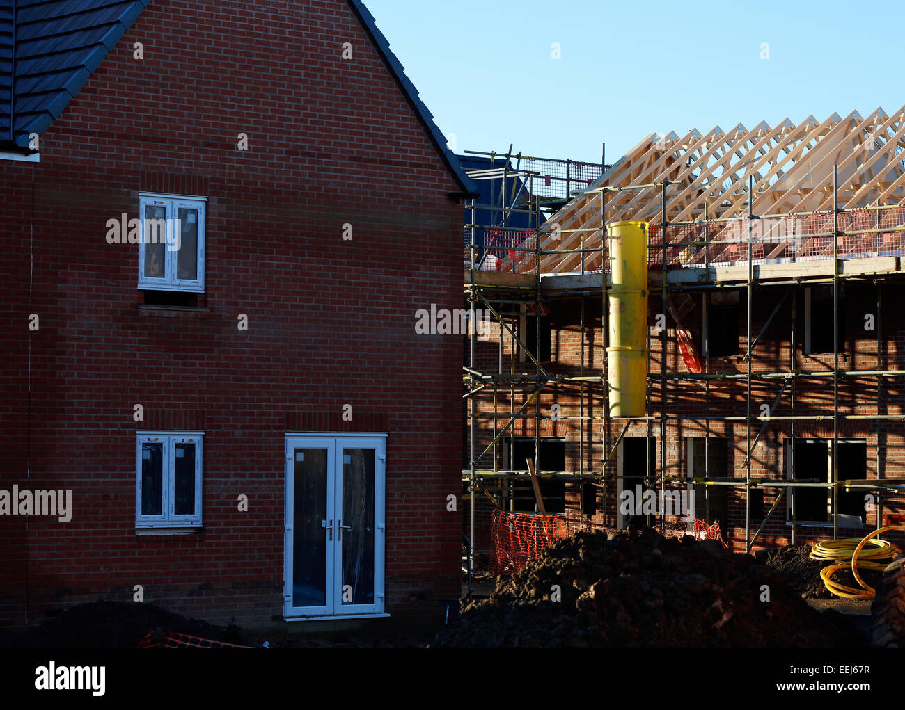 Houses are seen during construction during building a new residential ...