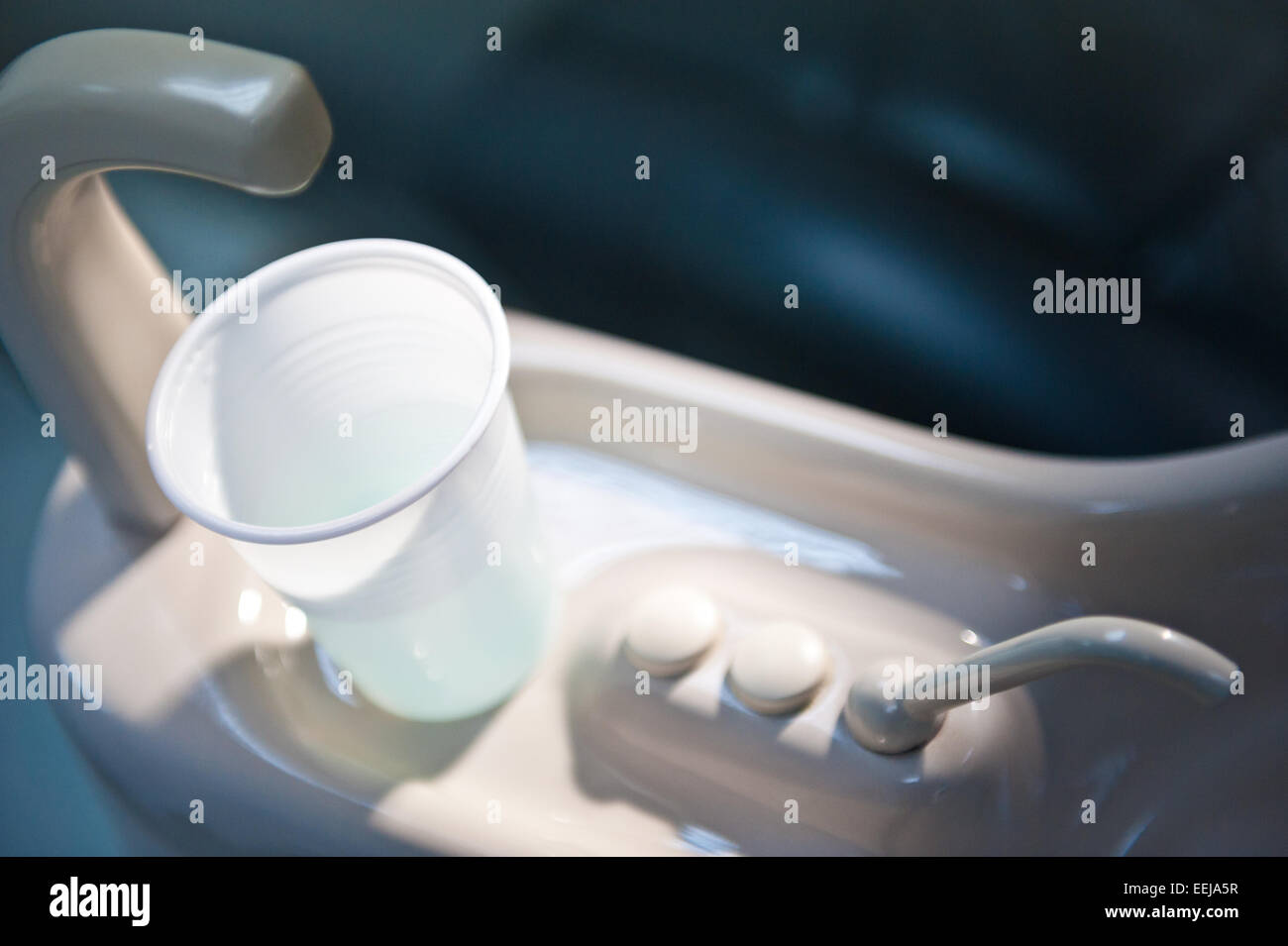 Mouth wash basin at dental practice Stock Photo - Alamy