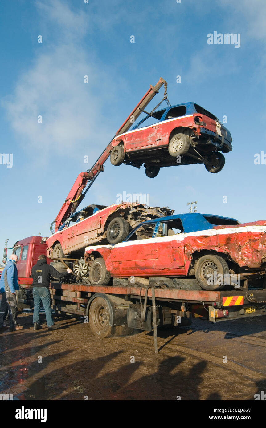 cars being unloaded from truck in the pits at a banger race Stock Photo ...